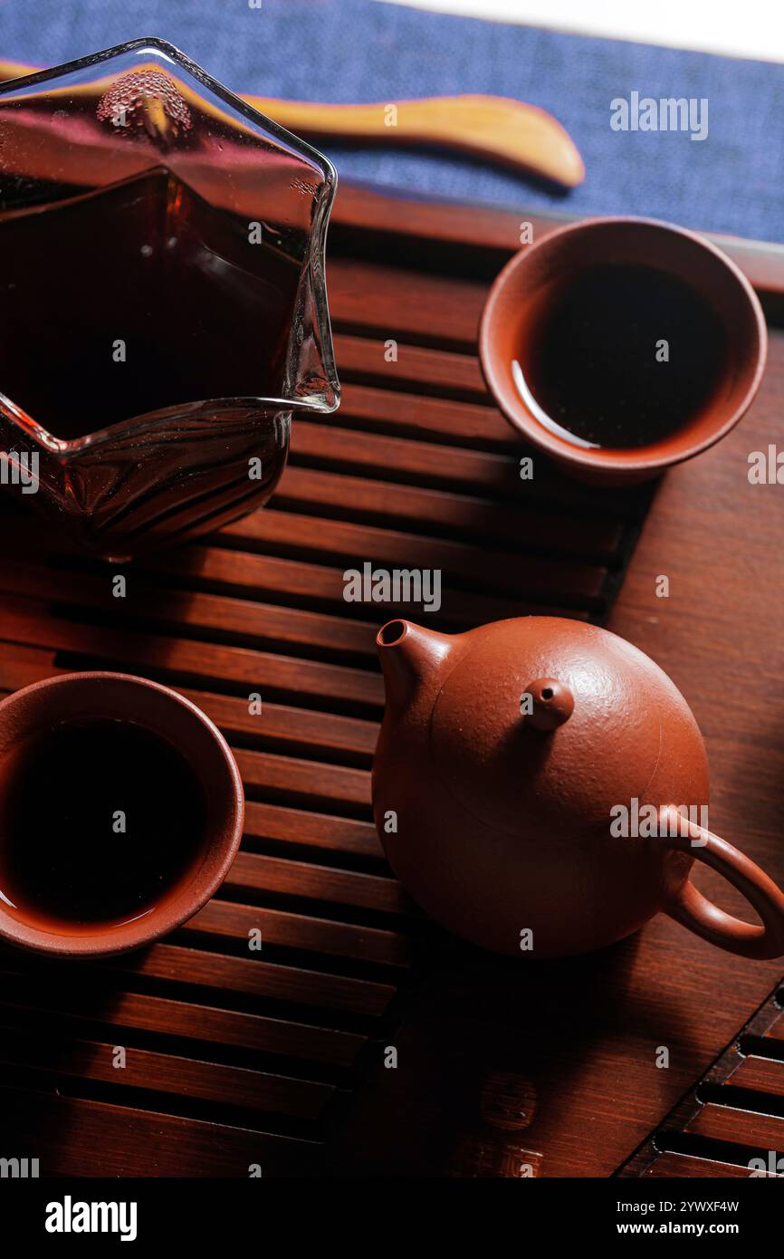 An Elegant Tea Set Displayed on a Wooden Tray Featuring a Traditional ...