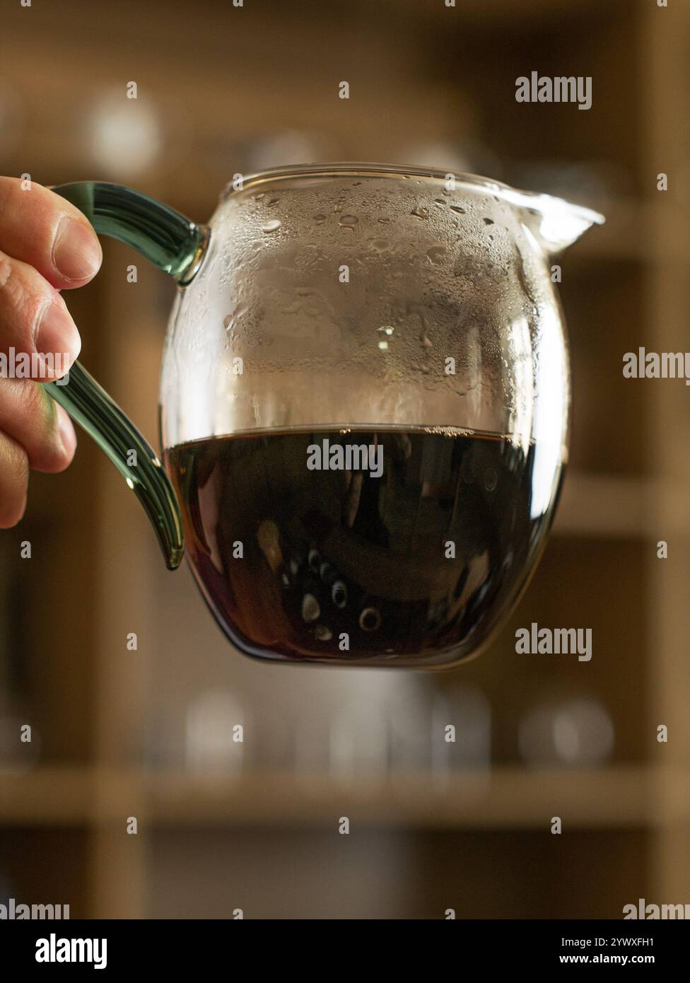Experience the delightful Artisan Coffee being elegantly poured into a ...