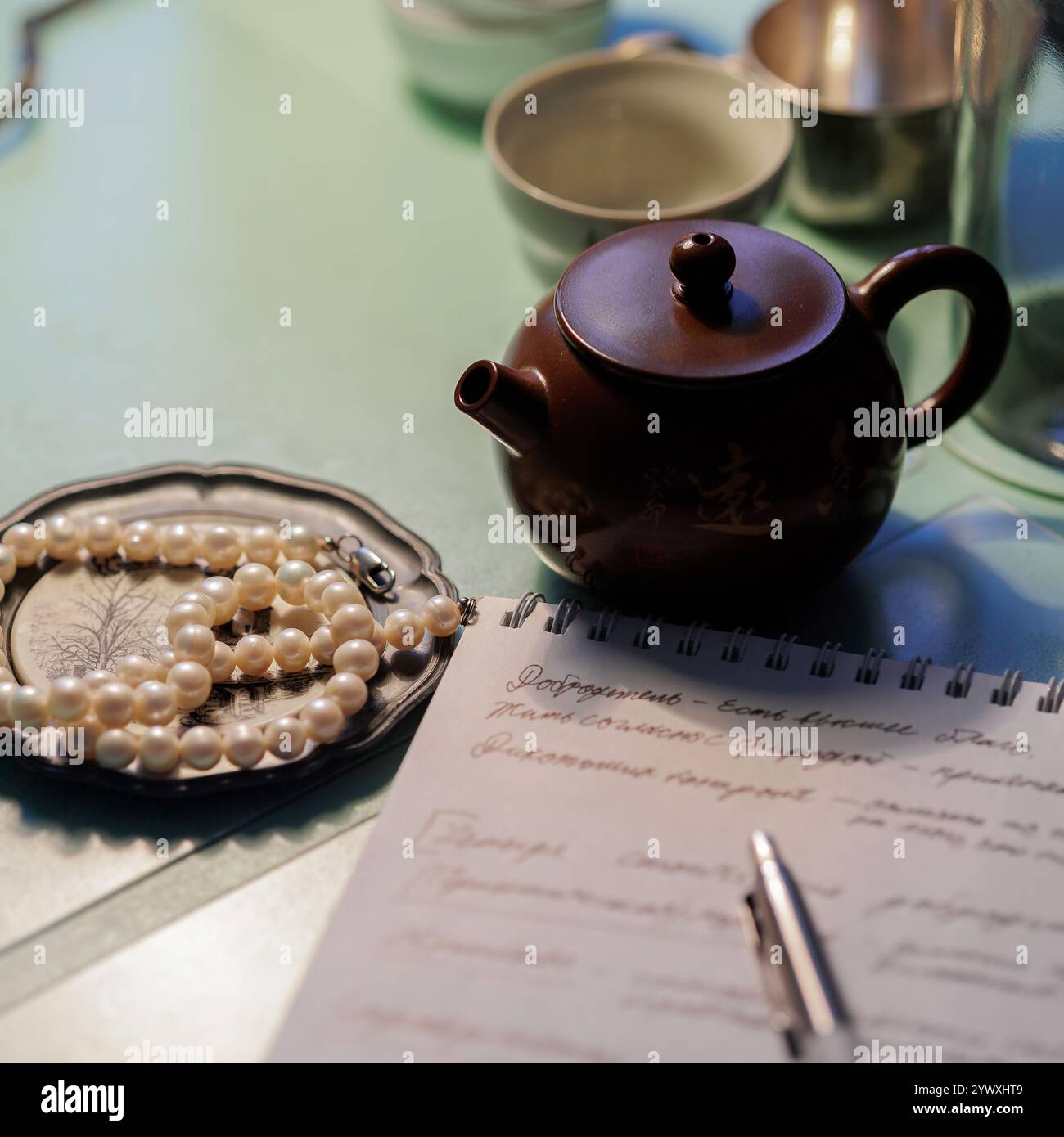 An elegant tea set with exquisite pearls and handwritten notes that ...