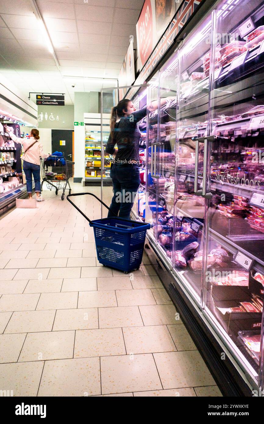 Shoppers people shopping inside a Lidl shop store in England in the UK ...