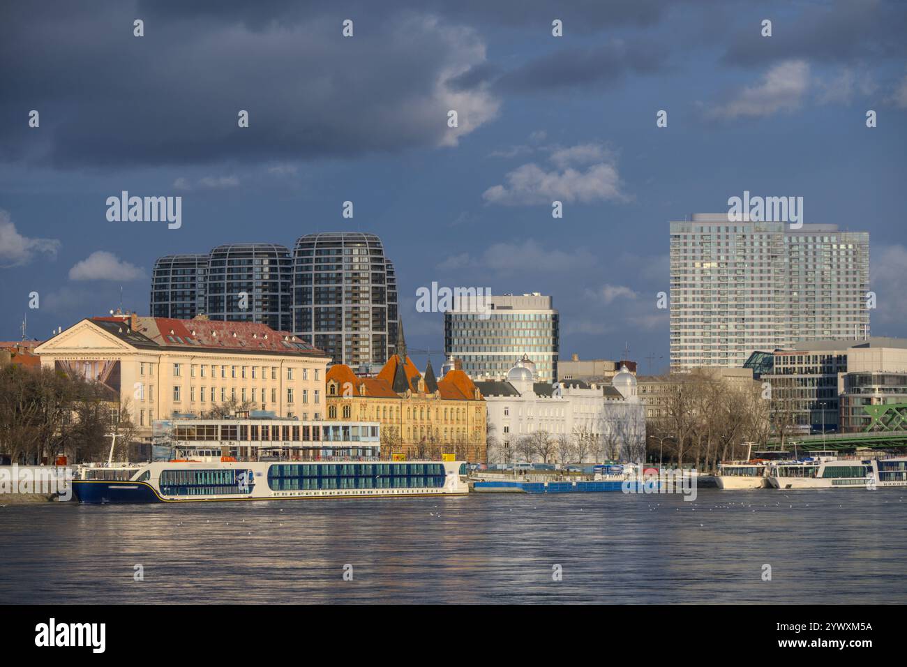 Riverside scene in Bratislava featuring historic and modern ...