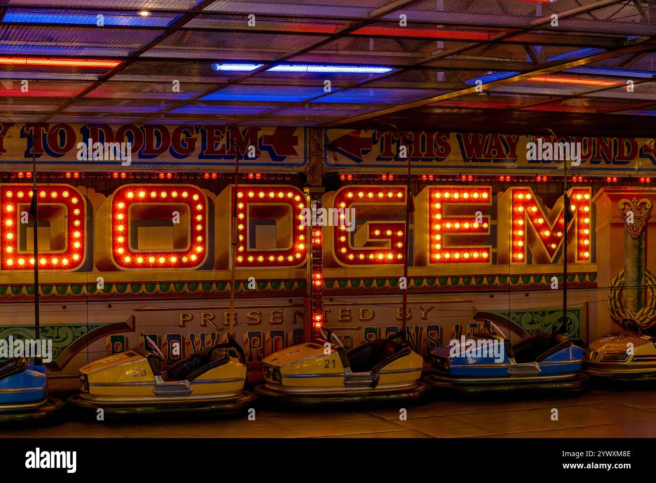 Detail of Vintage ‘Dodgem Cars’ Parked Under Colourful Lights Waiting For Drivers. With Detailed ...