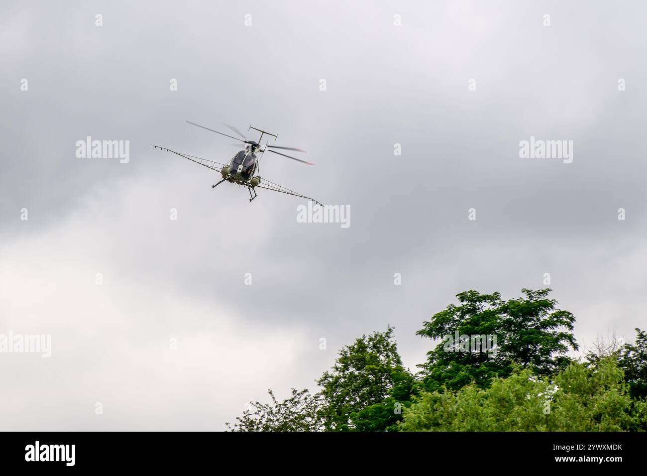 One helicopter flying low over hi-res stock photography and images - Alamy