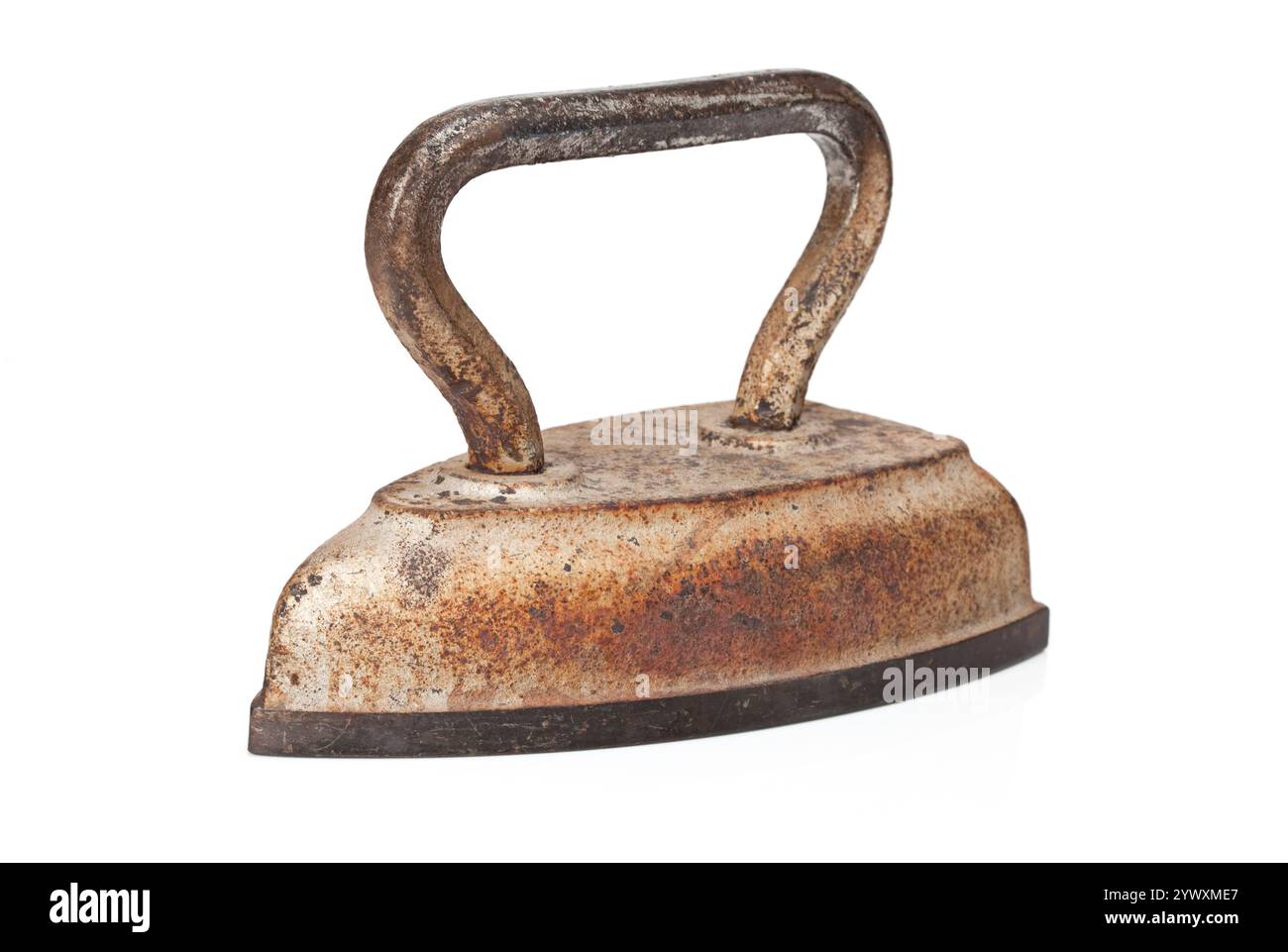Antique flat iron covered with rust on a white background Stock Photo ...