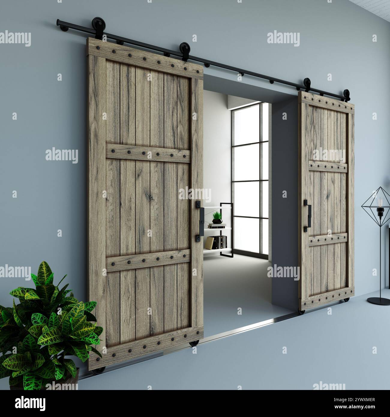 Barn Sliding Wooden Door in Loft Room Stock Photo - Alamy