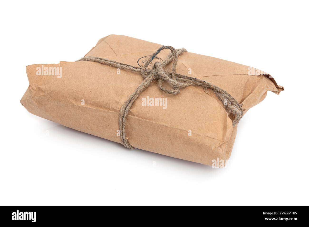 Old parcel tied with a string, isolated on white background Stock Photo ...