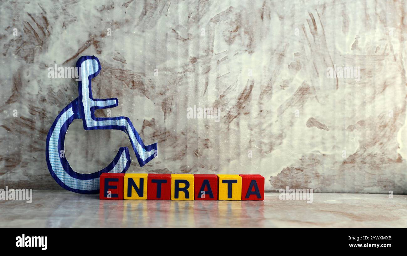 Disabled wheelchair symbol in colored cardboard with ENTRY written on ...