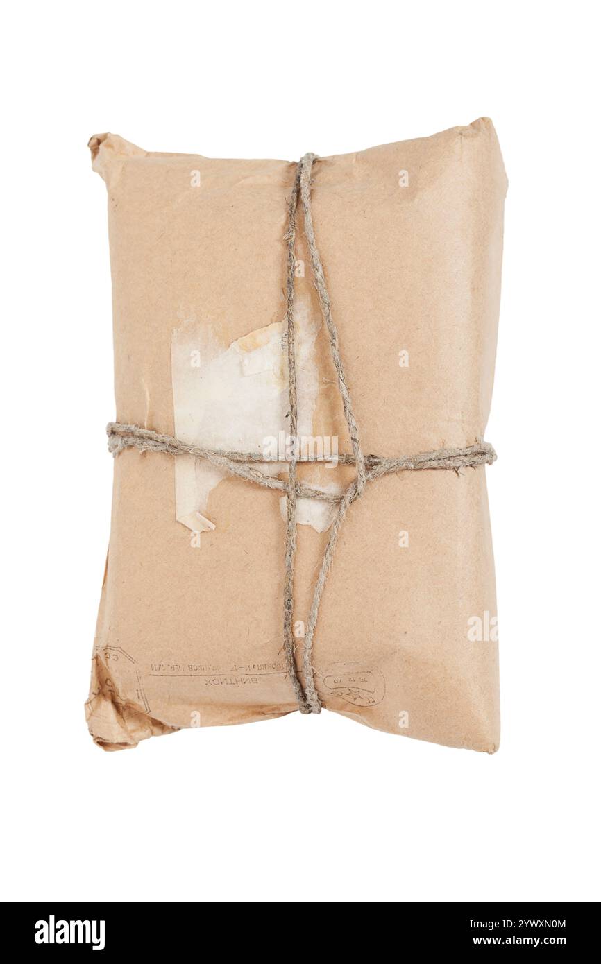 Front view of a post parcel tied with a string, isolated on white Stock ...