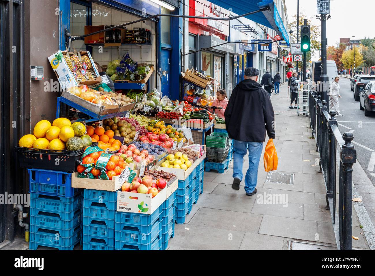 Shops with fruit and vegetable produce on the pavement in Junction Road ...