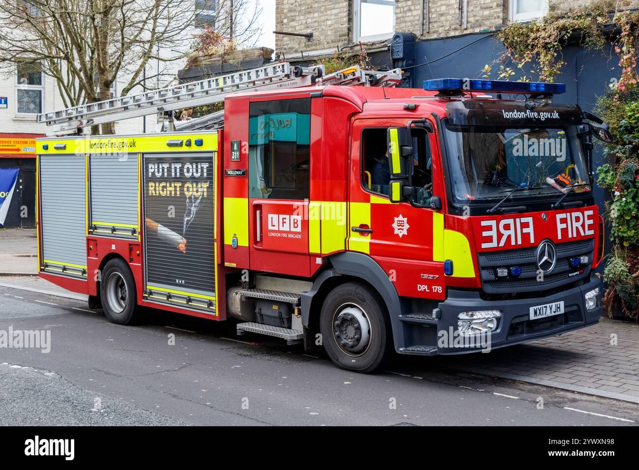 A London Fire Brigade fire engine parked by the roadside in North ...