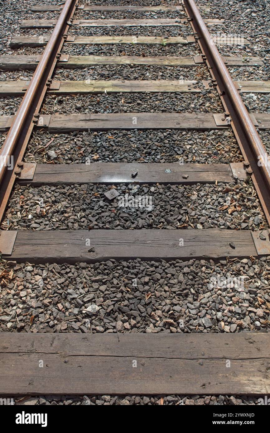 Closeup of railway track, ballast stones, metal rails Stock Photo - Alamy