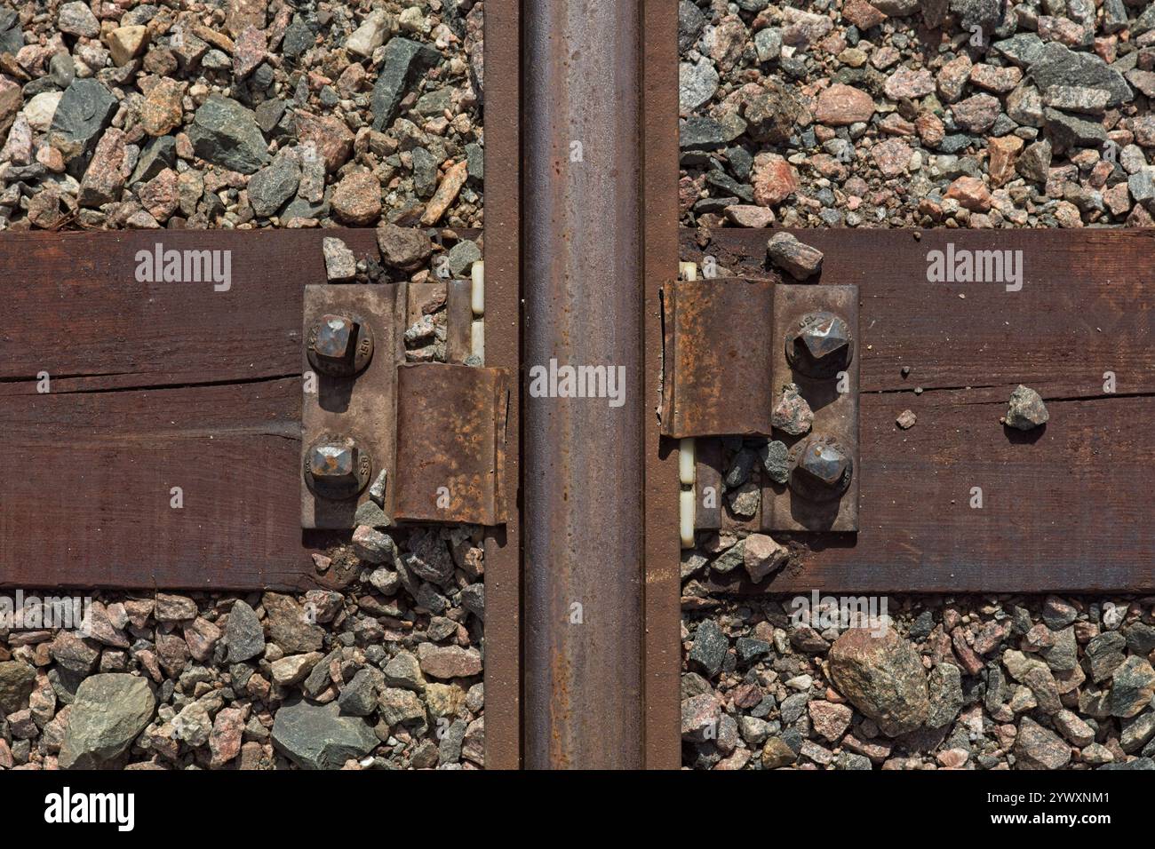 Closeup of railway track, ballast stones metal rail Stock Photo - Alamy