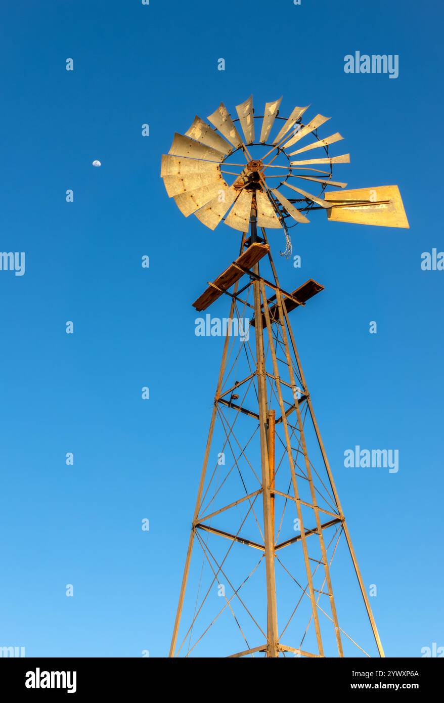 Old windmill and the moon, water wind pump, Namibia, Africa Stock Photo ...