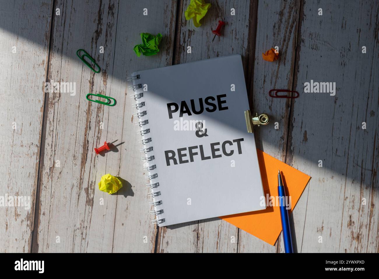 Blackboard written pause reflect with alarm clock. Pause and reflect ...