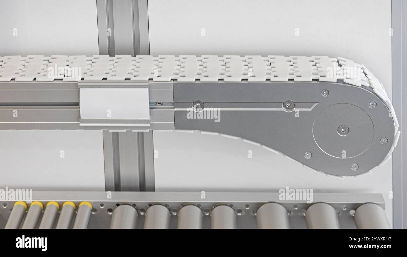 Flat Top White Chain Conveyor Belt Transport in Factory Stock Photo - Alamy