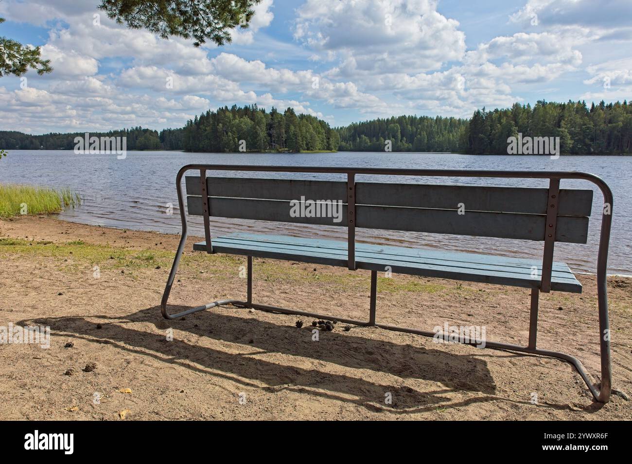 Wooden bench at Moksi beach in summer, Moksi, Finland Stock Photo - Alamy