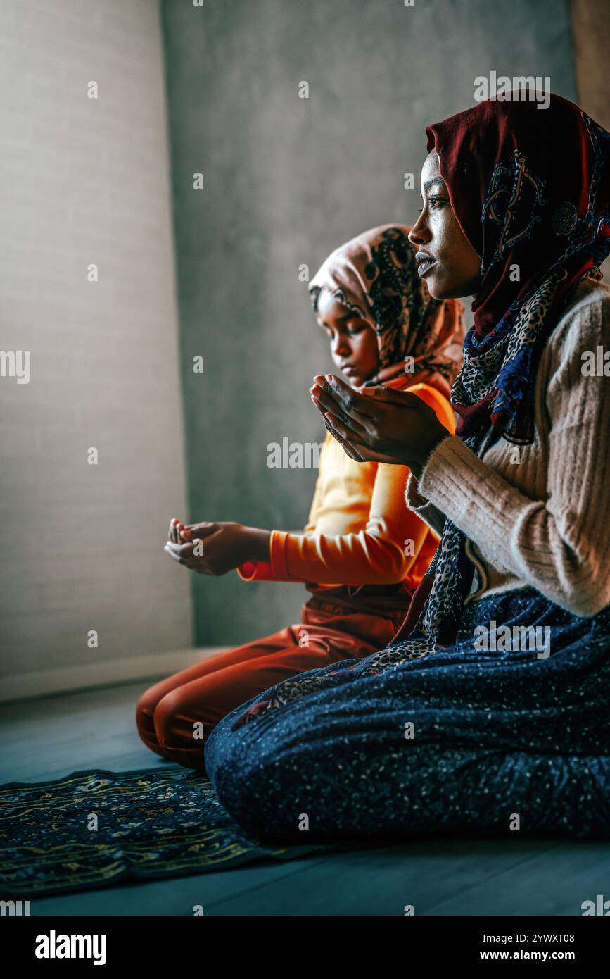 Portrait of muslim mother with child during islamic religious cultural ...