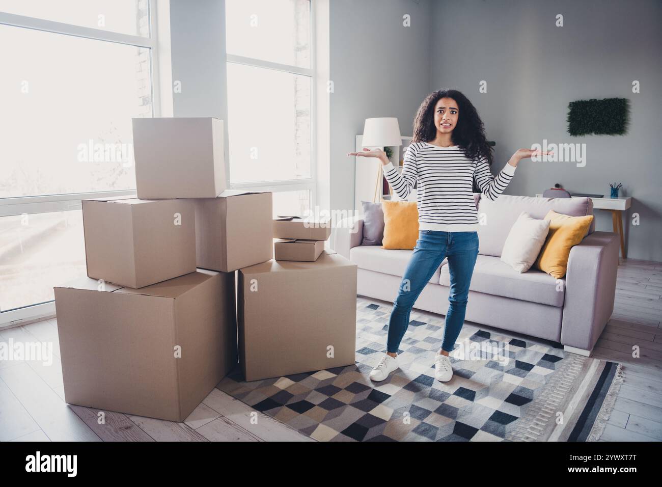Full body portrait of nice young girl pile stack box shrug shoulders ...