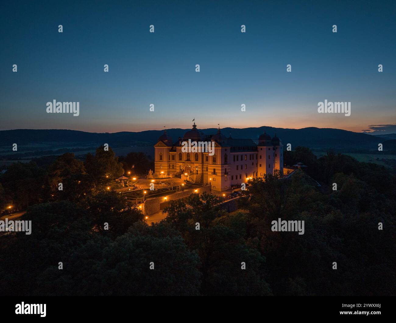Aerial night view of Halic Castle in the village of Halic in Slovakia ...