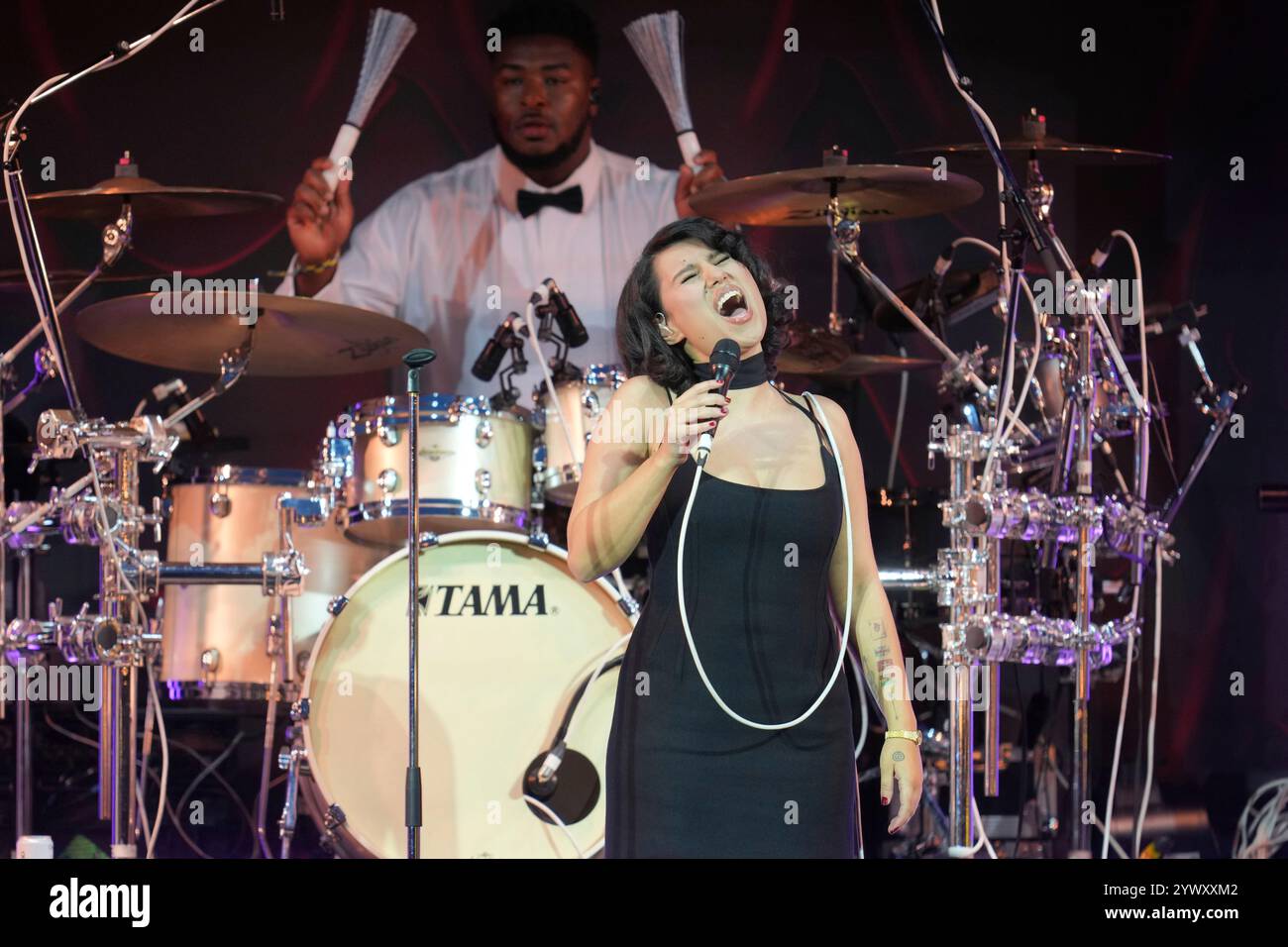 British singer Raye performs during a visit to Apple's UK Headquarters ...