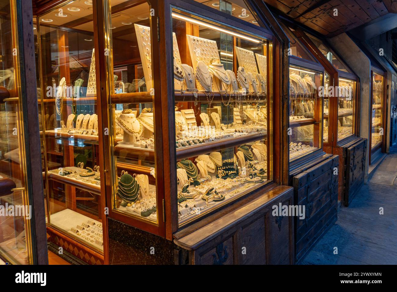 Luxury jewelry stores line the Ponte Vecchio bridge in Florence, Italy ...