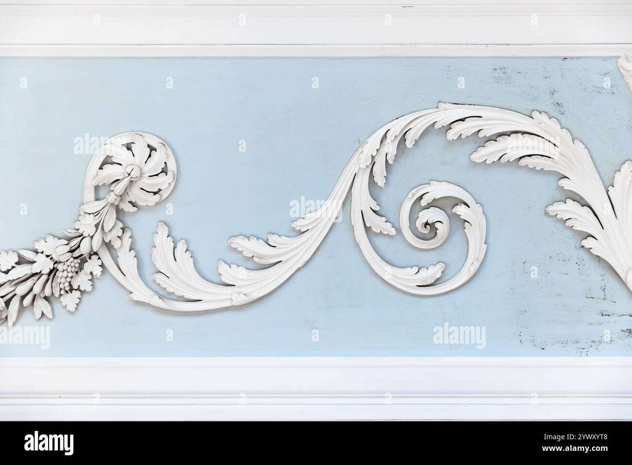 White bas-relief details over blue backdrop. Classic wall moulding ...