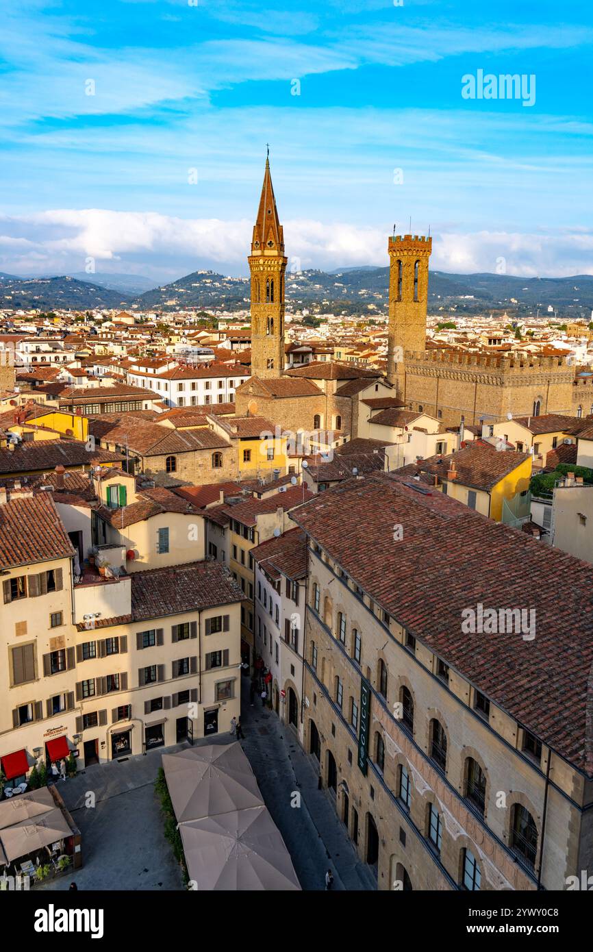 View of the towers of the Badia Fiorentina & Palazzo del Bargello seen ...