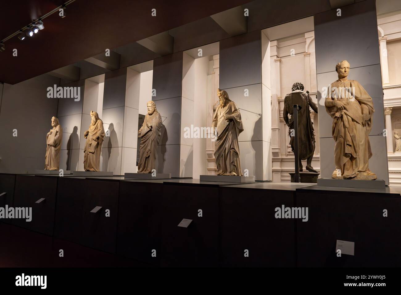 Statues in a display hall in the Duomo Museum in Florence, Italy. Circa ...