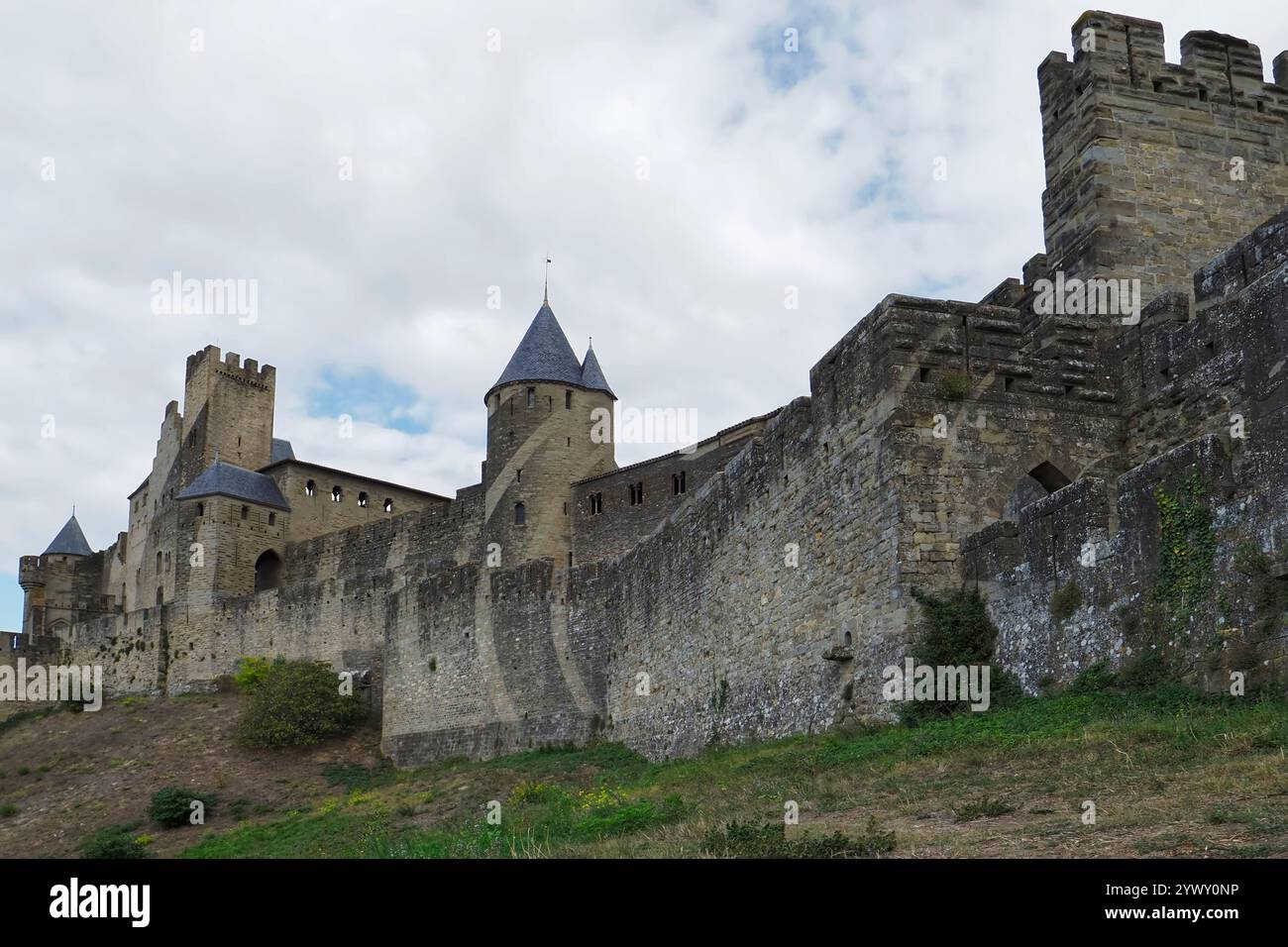 the outer stone walls and turrets of Carcassonne Medieval city, France ...