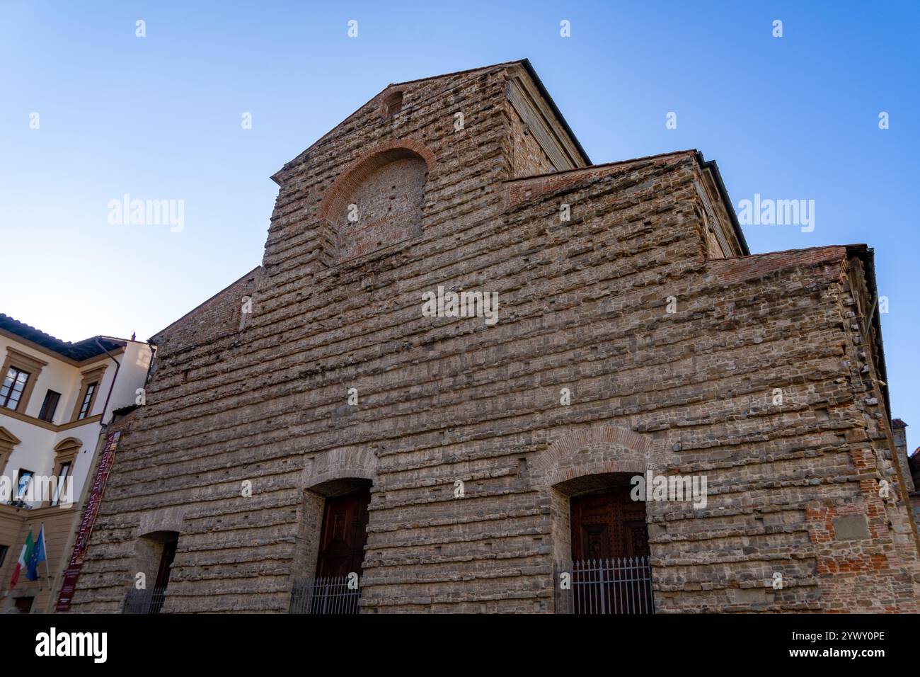 Austere facade of the medieval Basilica di San Lorenzo in Florence ...