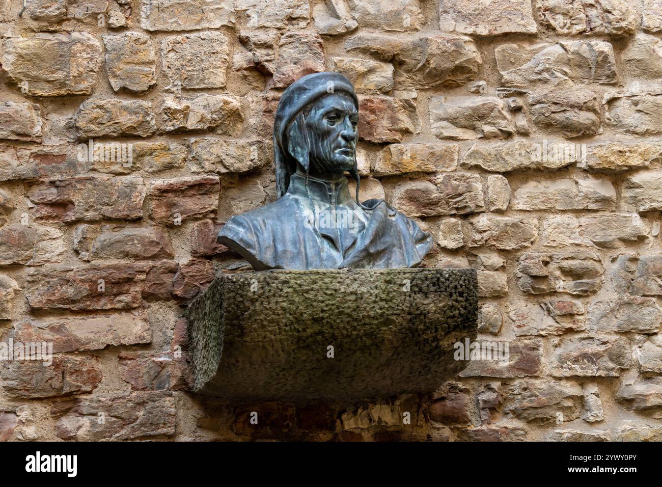 A bust of Dante Alighierei on the tower wall by the House of Dante, now ...