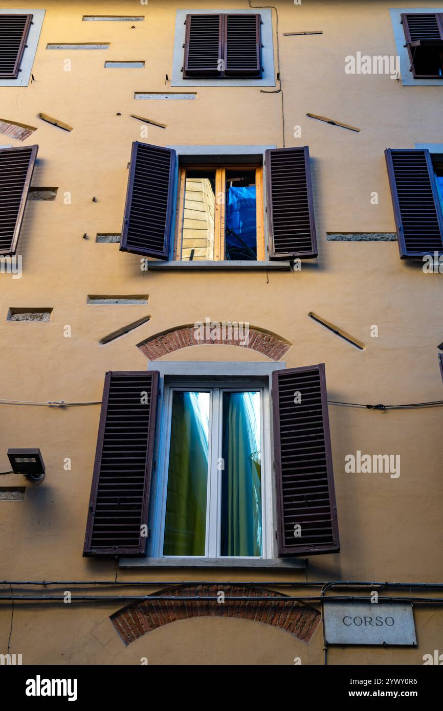 Architectural detail with cutouts in the stucco showing details of the ...