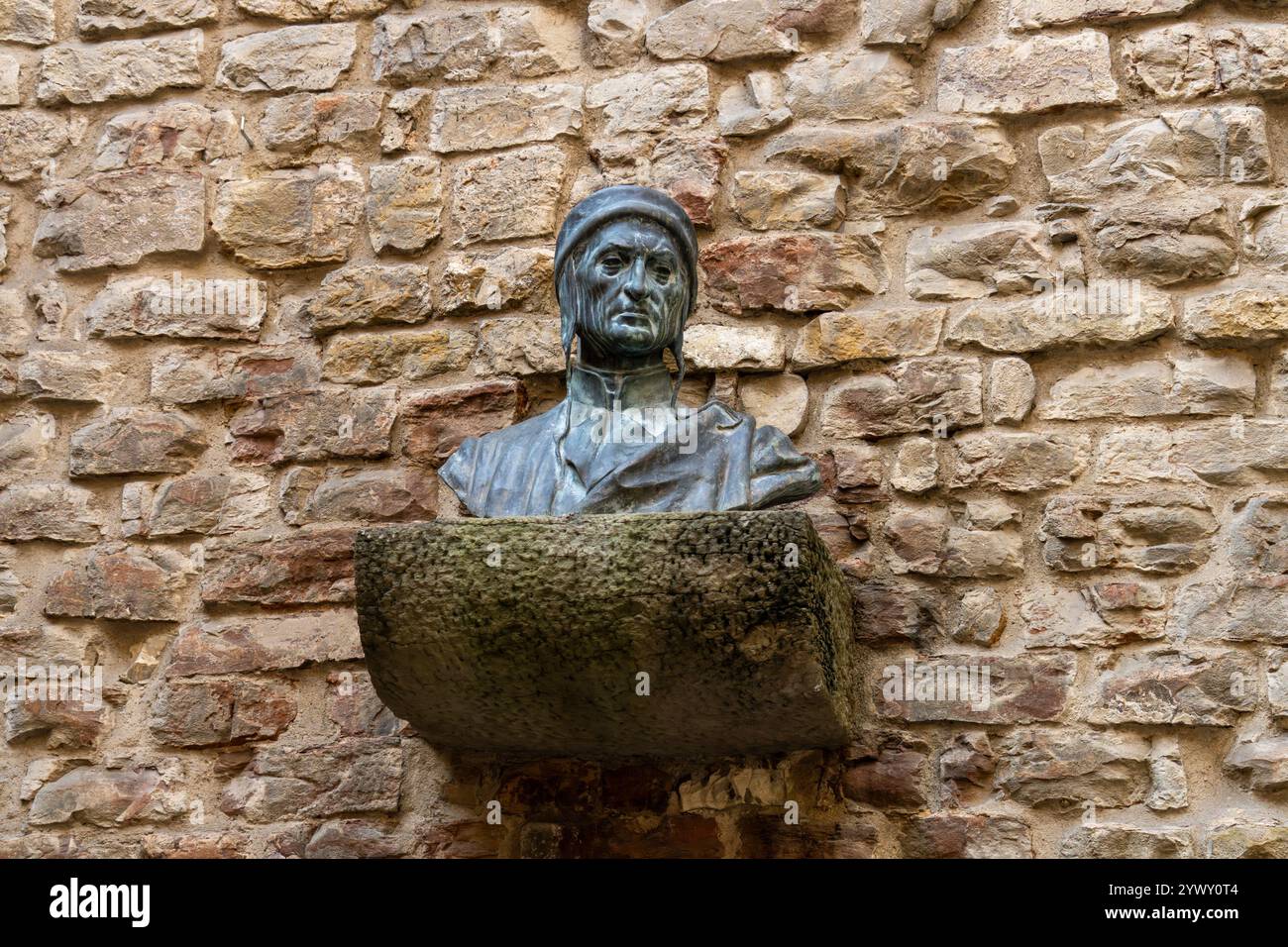 A bust of Dante Alighierei on the tower wall by the House of Dante, now ...