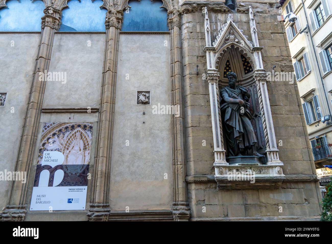 Statue of St. Luke on the Orasanmichele Church in Florence, Italy. St ...