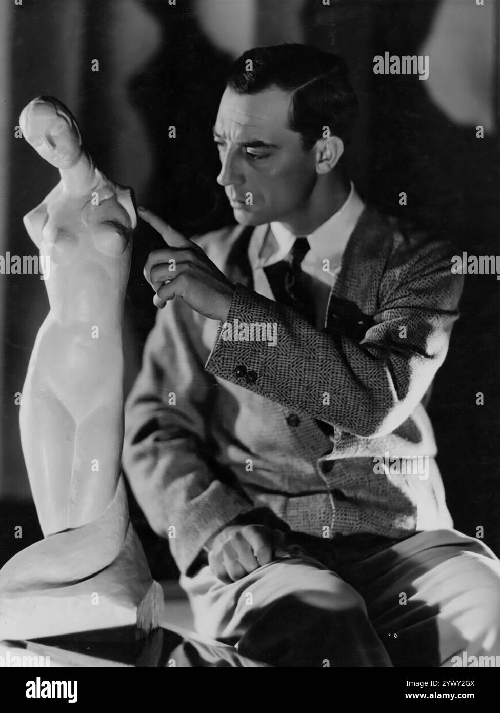 Portrait of actor Buster Keaton with statue, photo by Hurrell Stock ...