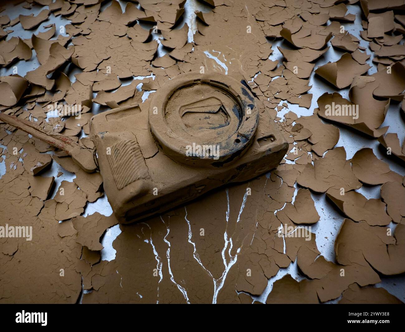 Camera covered in mud from Valencia floods, showing the devastat Stock ...
