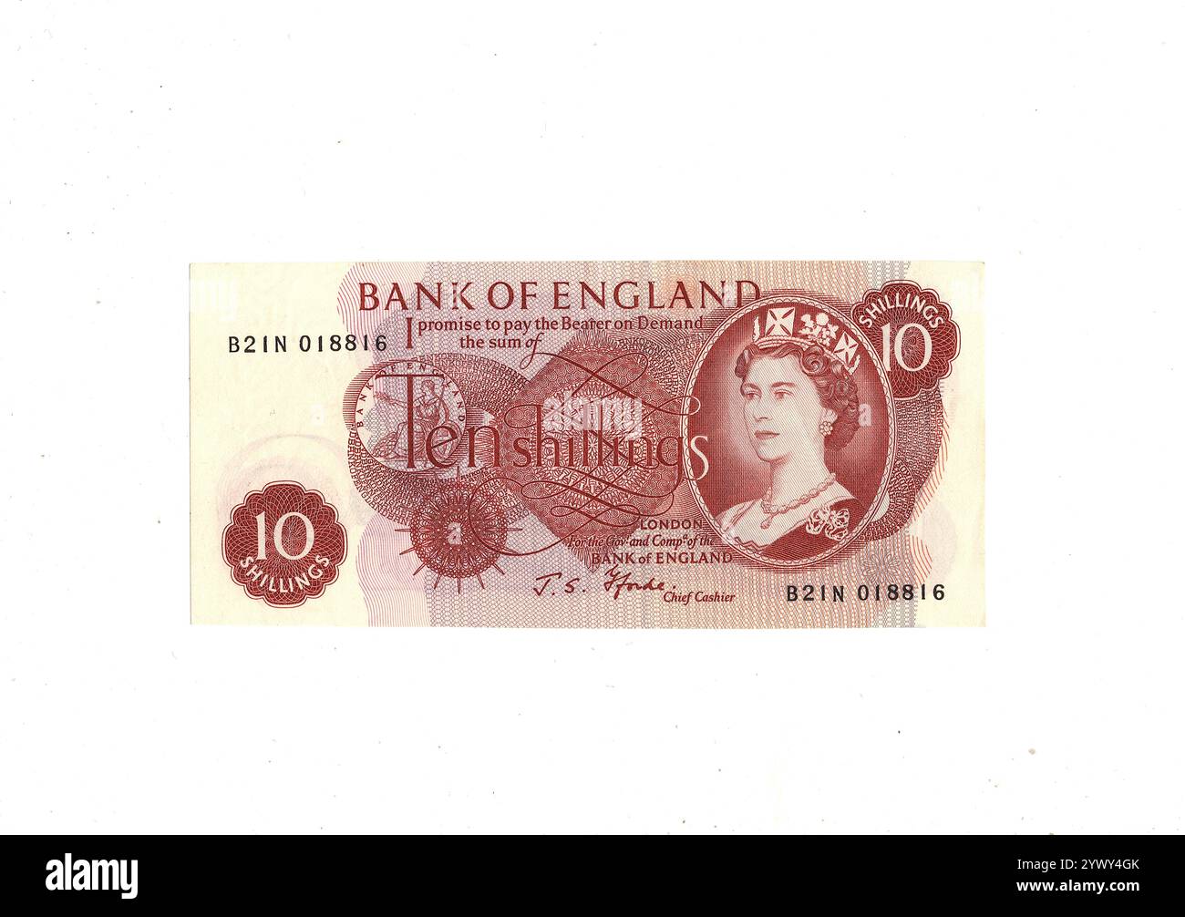The front of a vintage ten shilling note from Great Britain on a white ...