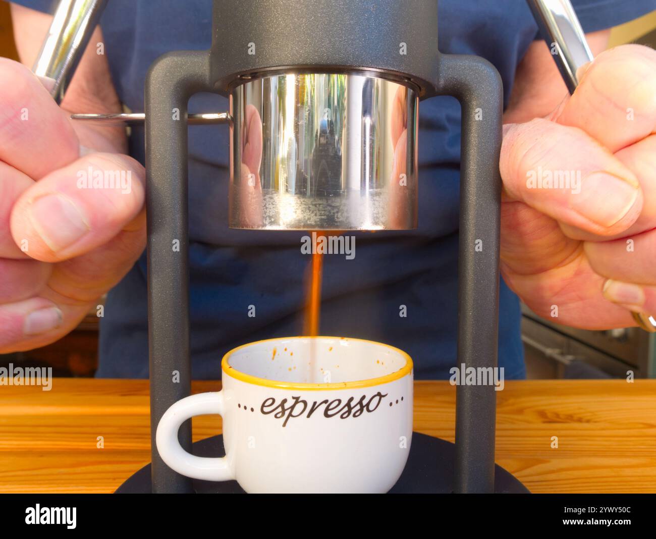 Pushing hands down hi-res stock photography and images - Alamy