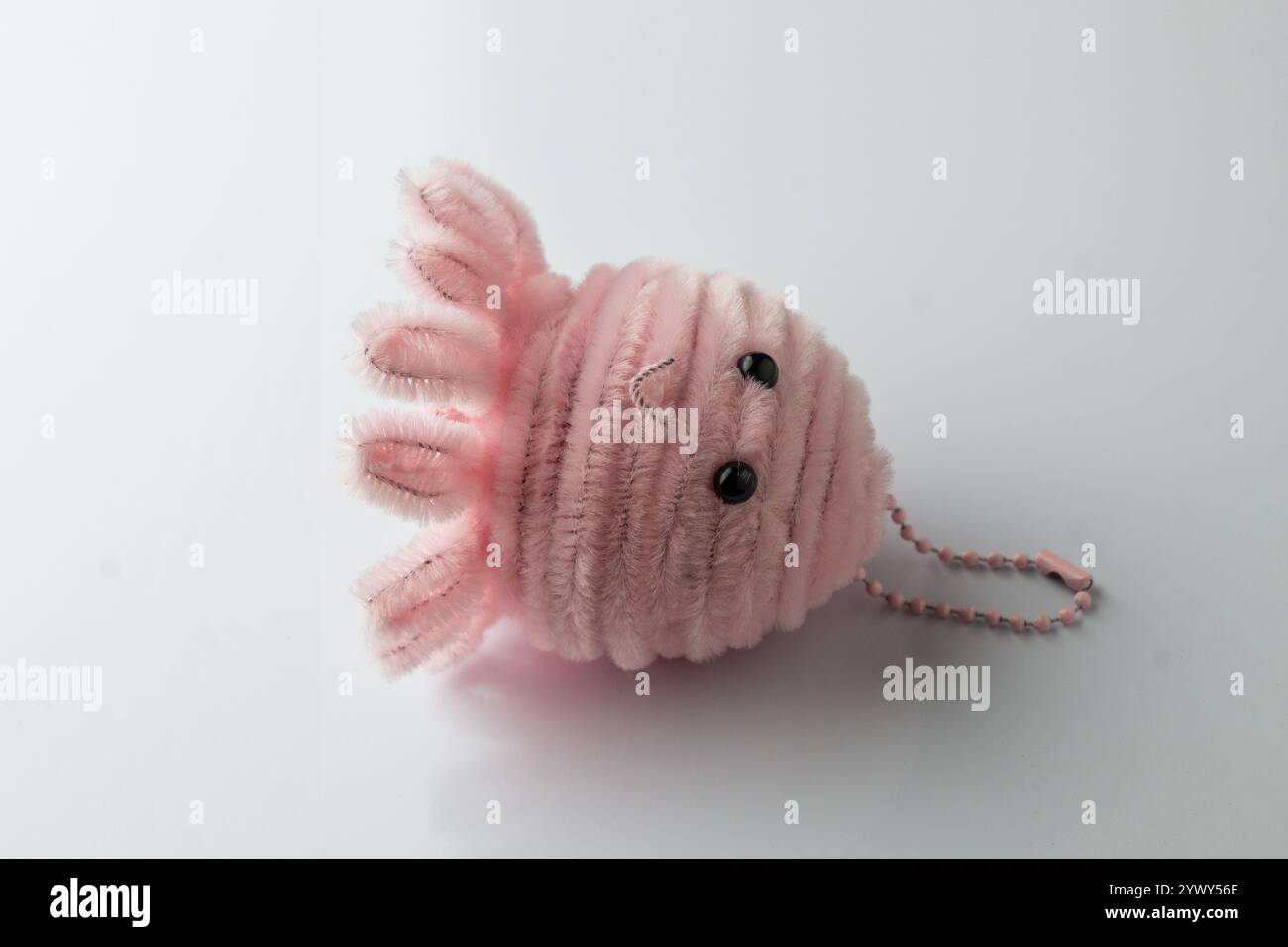 top view of pink small octopus pipe cleaner mini keychain toy with ...