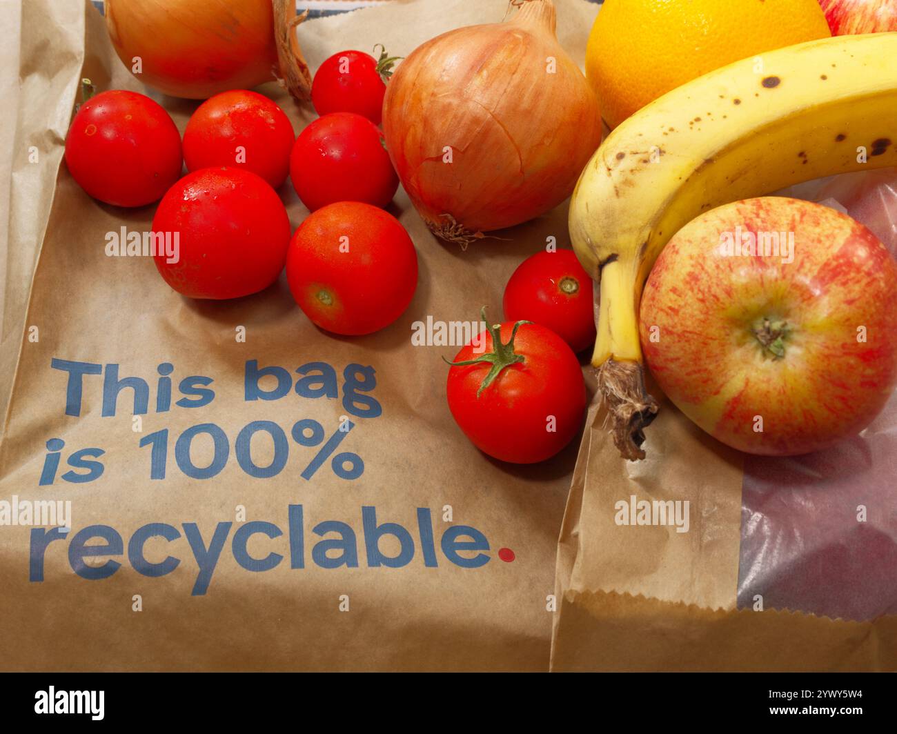 Closeup of fruit and vegetables on supermarket paper and plastic ...