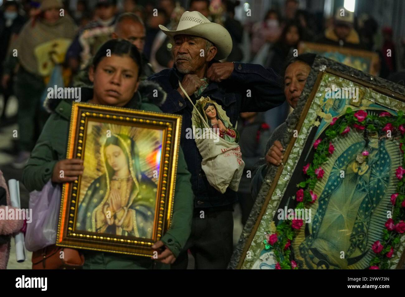 Pilgrims gather outside of the Basilica of Our Lady of Guadalupe in one ...