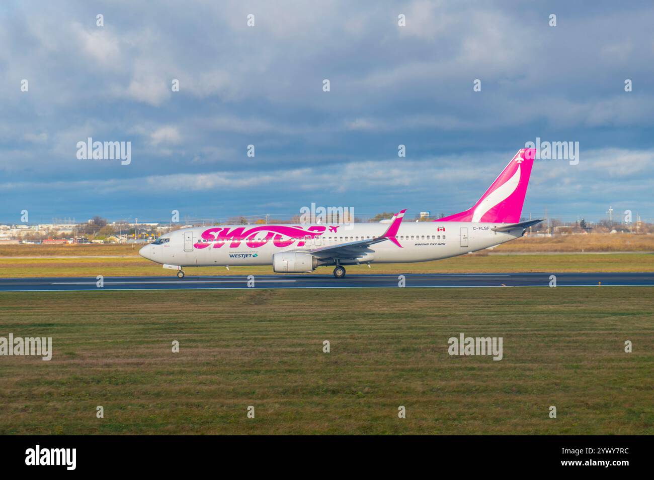 WestJet Boeing 737-8CT C-FLSF with Swoop livery at Toronto Pearson ...