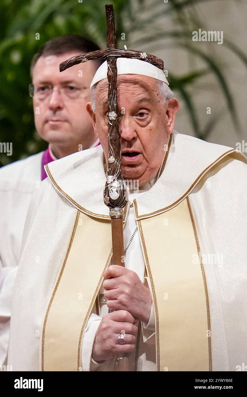 Pope Francis, flanked by Bishop Jan Dubina presides over a mass to ...