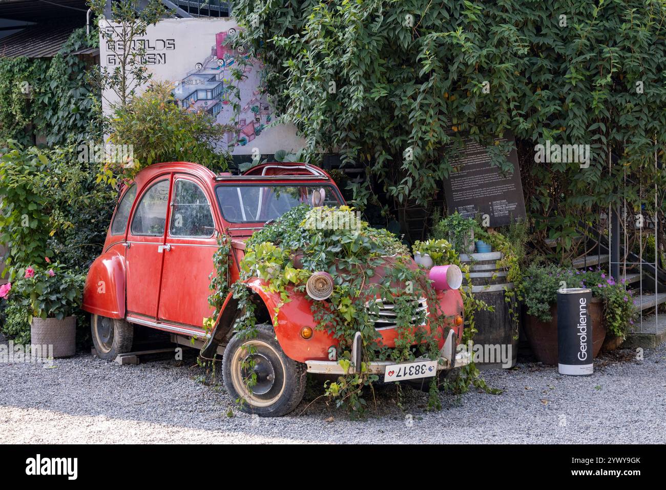 Red car statue/street art Stock Photo - Alamy