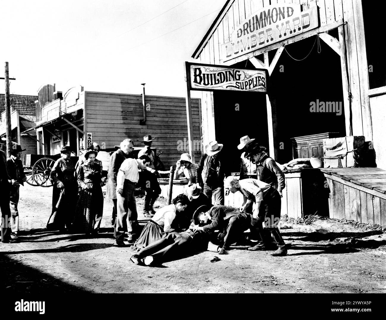 Audrey Dalton, Willard Parker, Dabs Greer, on-set of the Western film, "Lone Texan", 20th ...