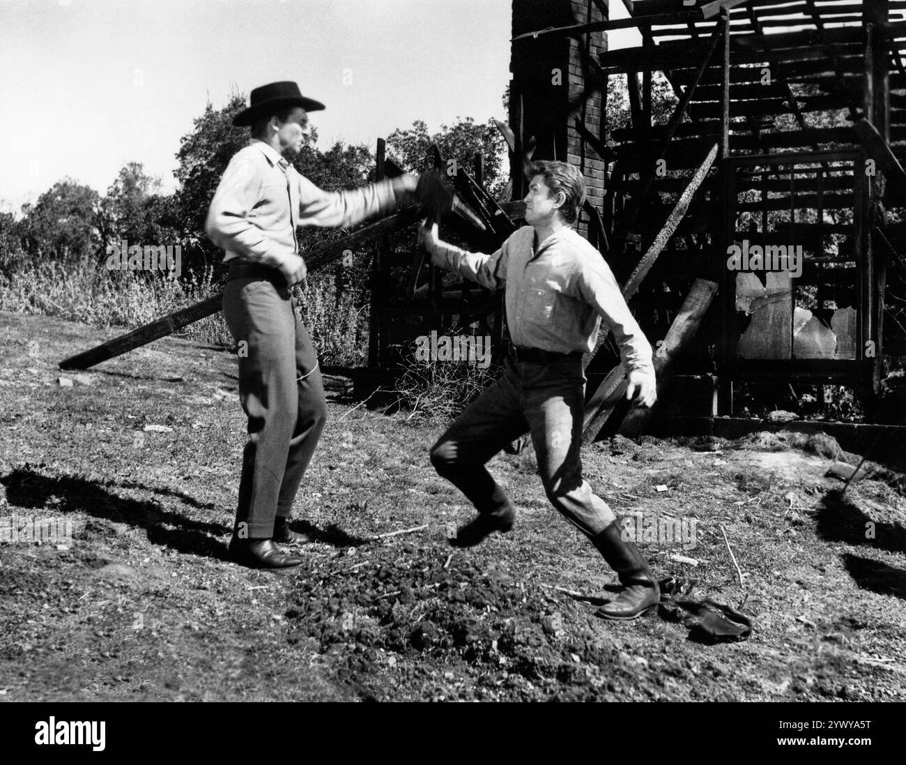 Michael Landon (right), Jack Hogan (left), on-set of the western film ...