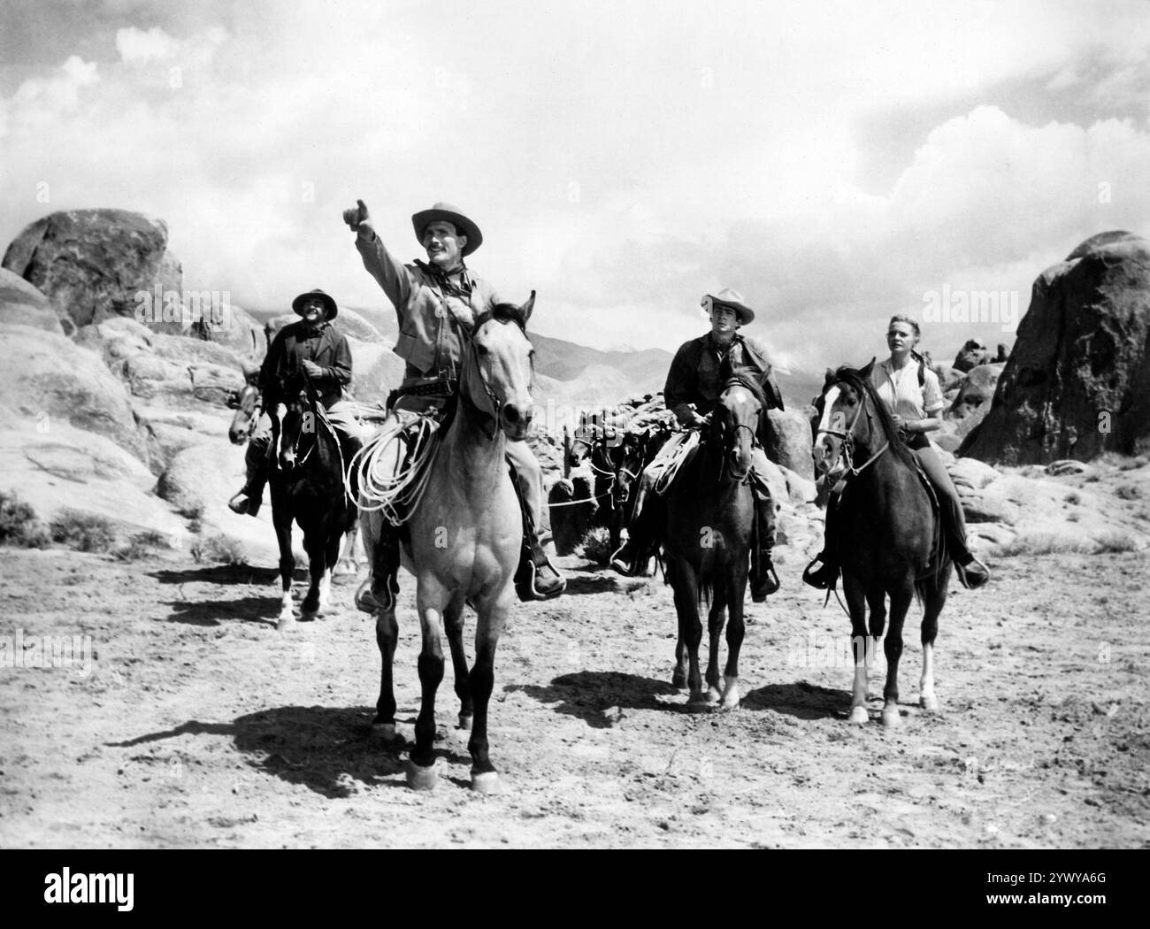 Jack Palance, Anthony Perkins, Elaine Aiken, on-set of the western film ...