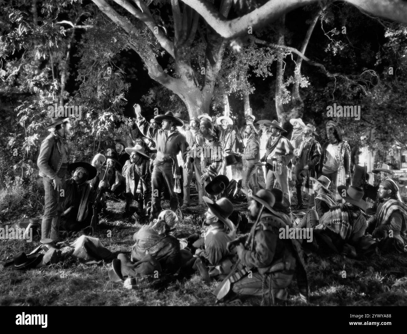 Richard Barthelmess (standing center with raised arm), on-set of the ...
