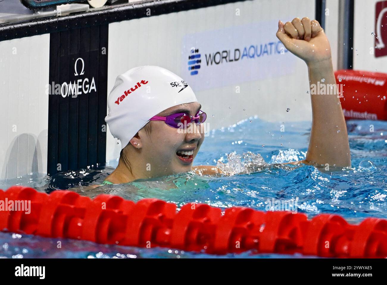 China's Qianting Tang reacts after winning the 100-meter breaststroke ...