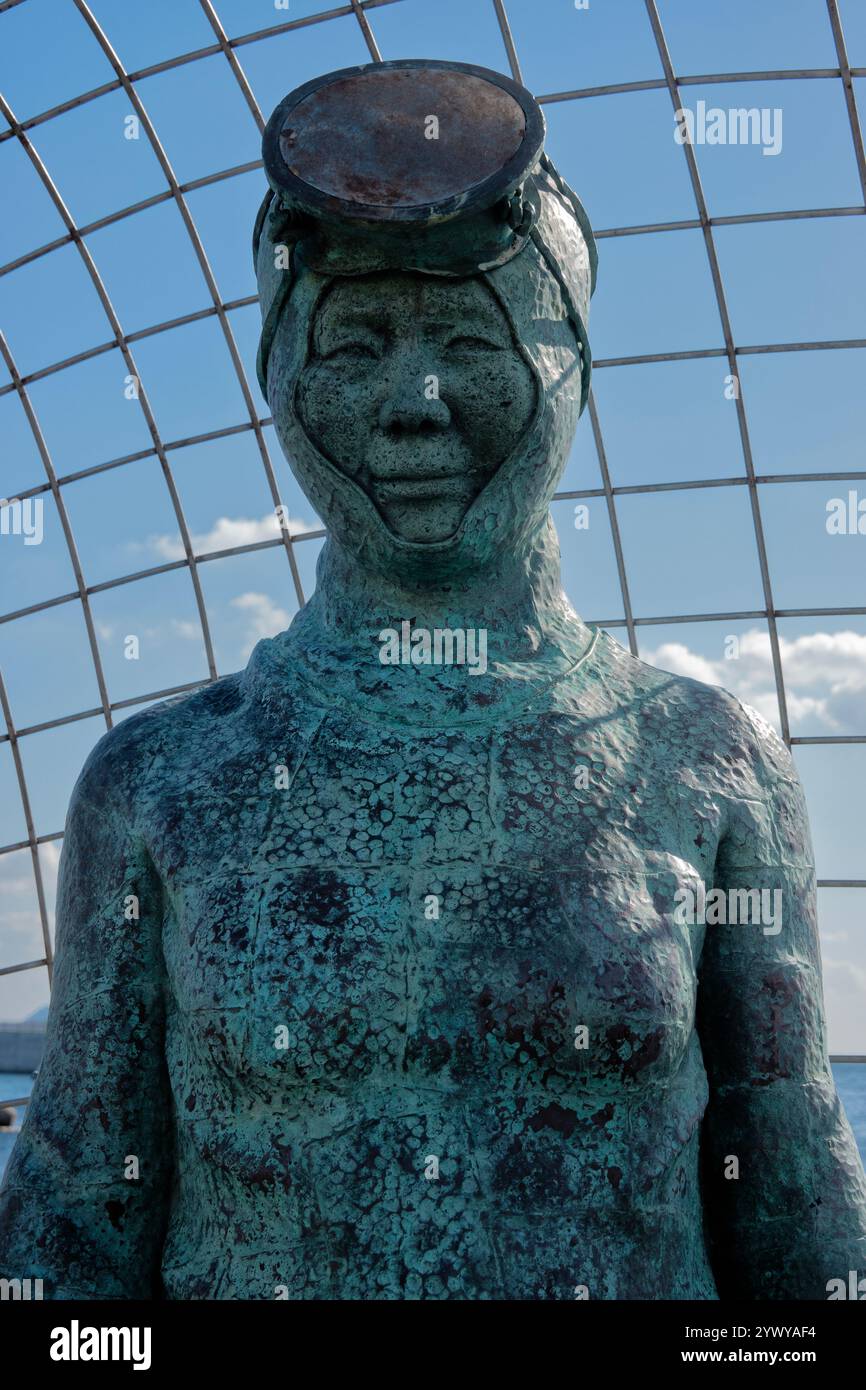 Haenyo woman diver statue along the Jeju Olle Trail, Jeju Island, South ...